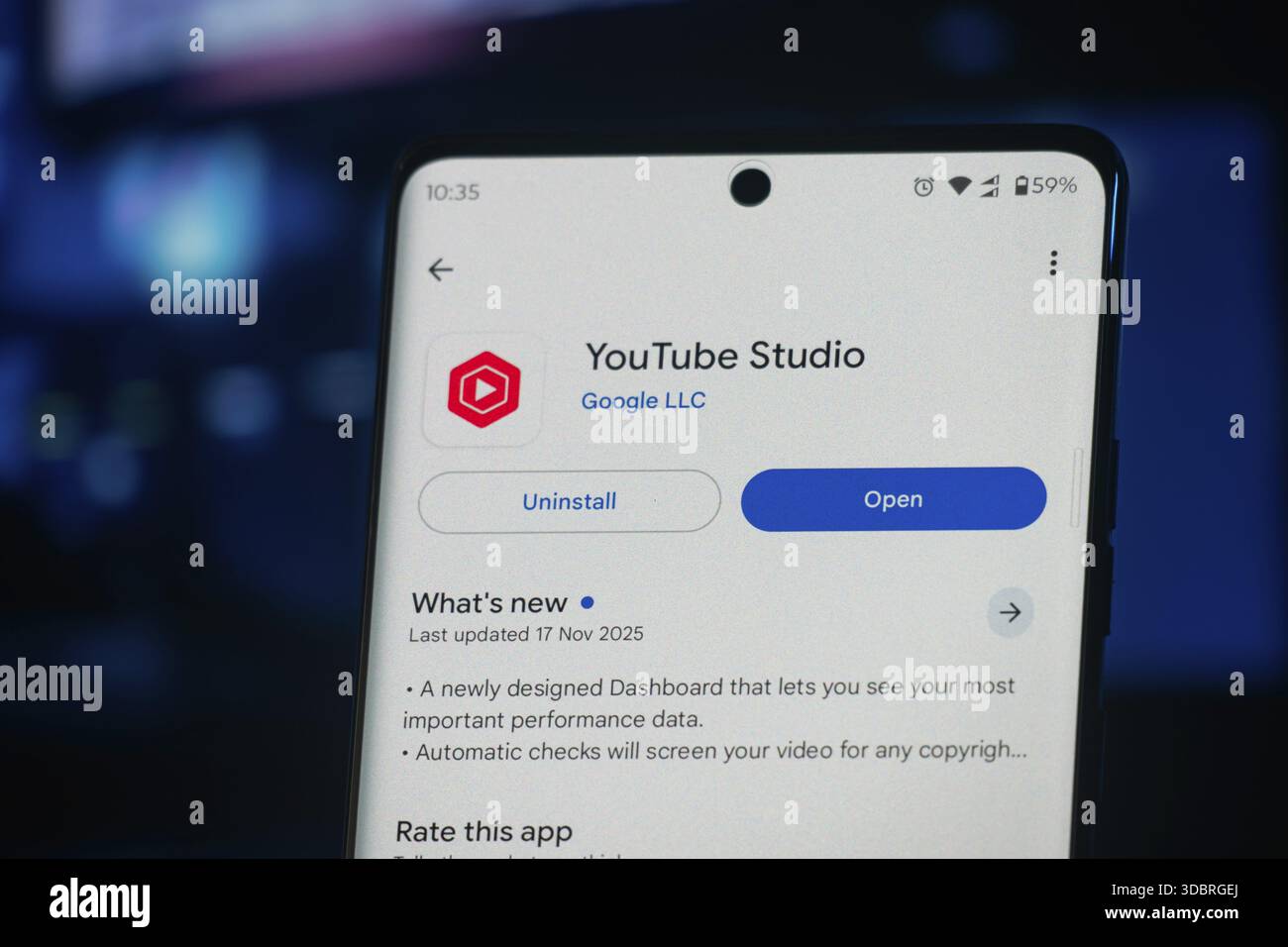 Smartphone screen showing YouTube Studio app with open and uninstall ...