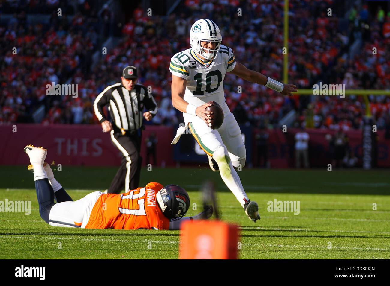 Green Bay Packers quarterback Jordan Love (10) runs a play against the ...