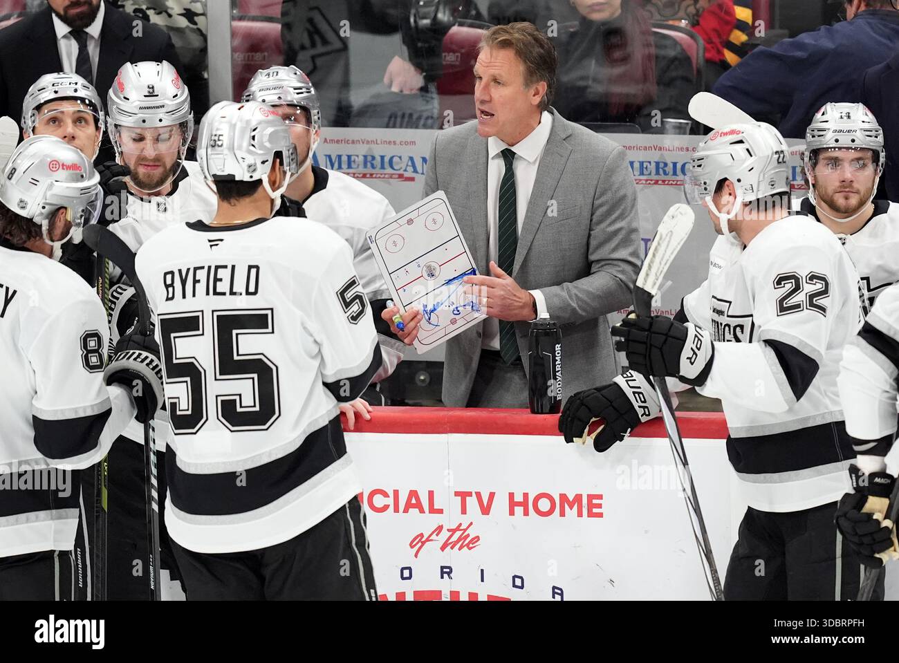 Los Angeles Kings head coach Jim Hiller talks to his players during the ...