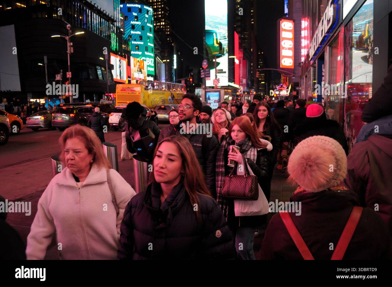 People walk in Times Square. (Photo by Jimin Kim / SOPA Images/Sipa USA ...