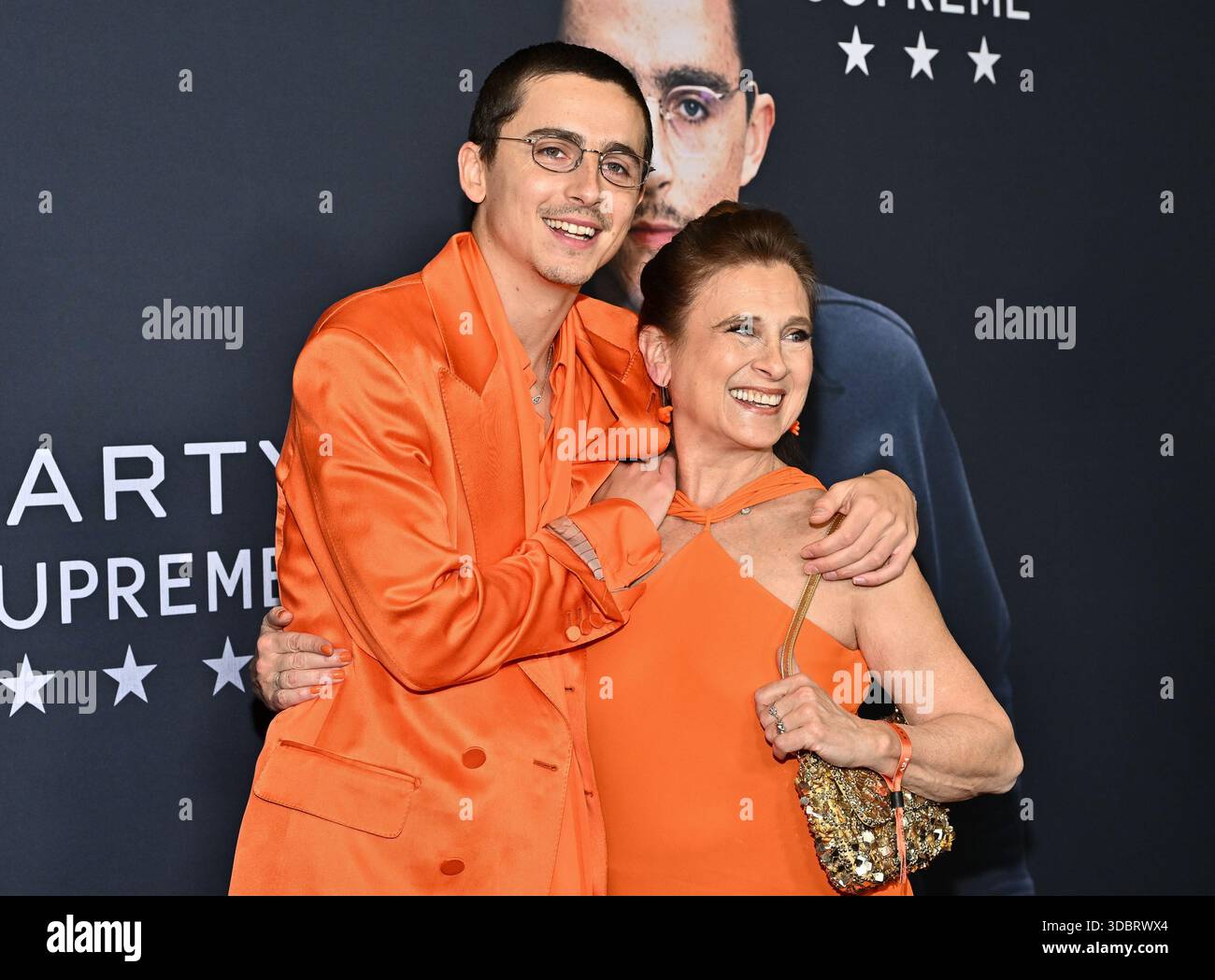 Timothée Chalamet, left, and mother Nicole Flender attend the premiere ...