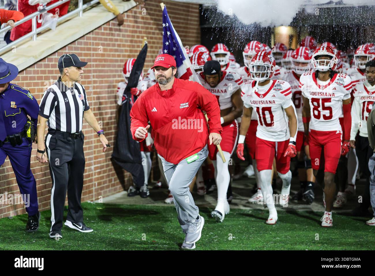 Dec 17, 2025: Louisiana head coach Michael Desormeaux leads his team ...