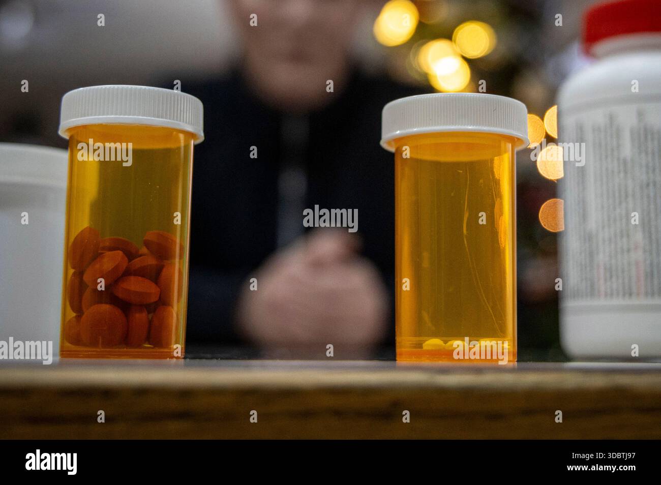 Shawna Dunn sorts pain control medication in Calgary, on Friday, Dec. 5 ...