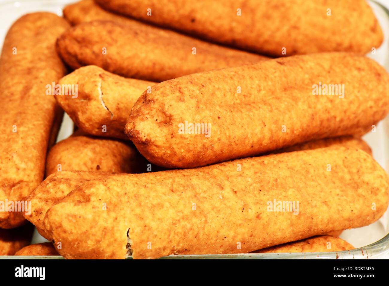 Golden-brown fried bulgur meatballs, known as koupes, a traditional ...
