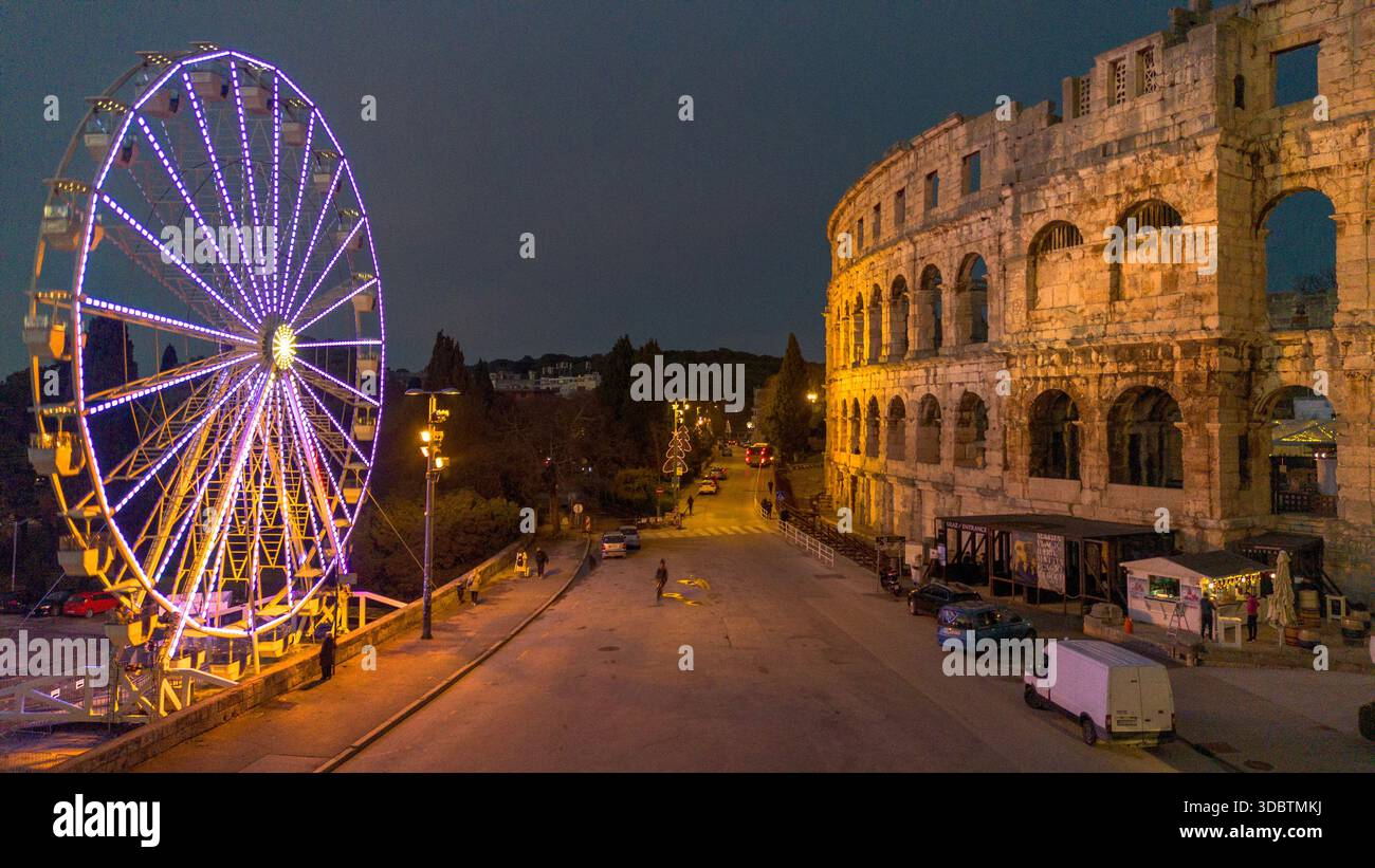 Aerial view of the Arena and the illuminated Ferris wheel during the ...