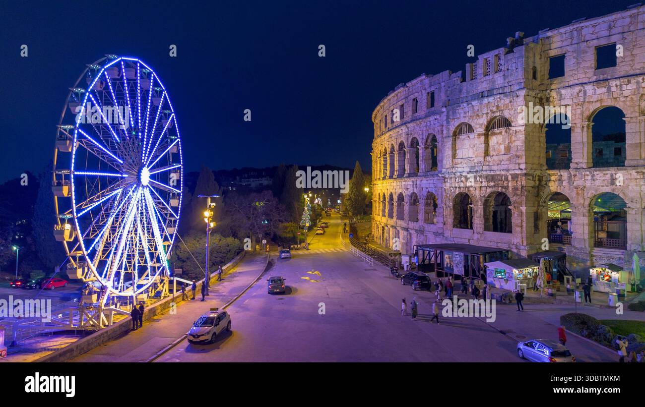 Aerial view of the Arena and the illuminated Ferris wheel during the ...