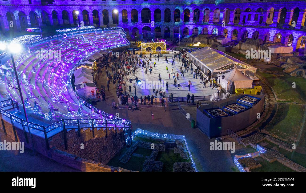 Aerial view of people ice skating during the opening ceremony of Advent ...