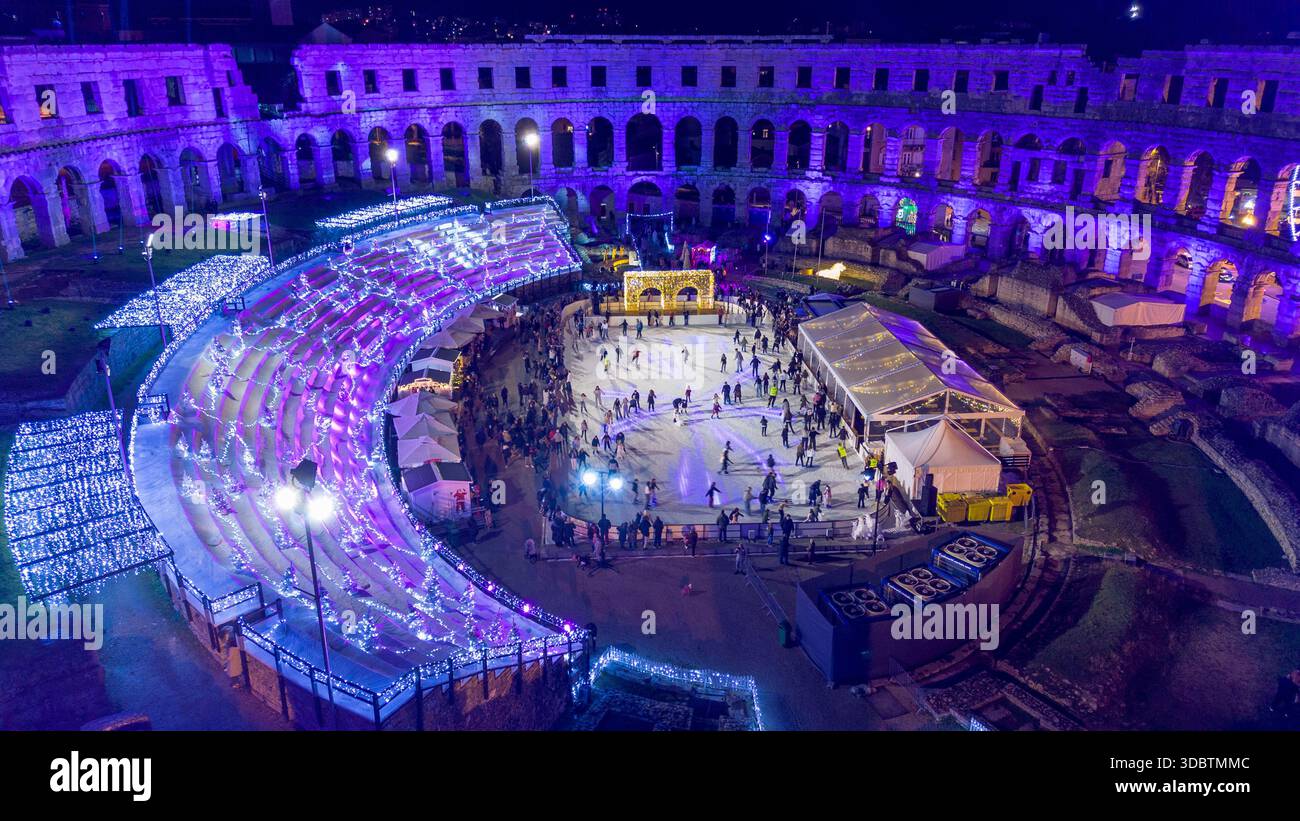 Aerial view of people ice skating during the opening ceremony of Advent ...