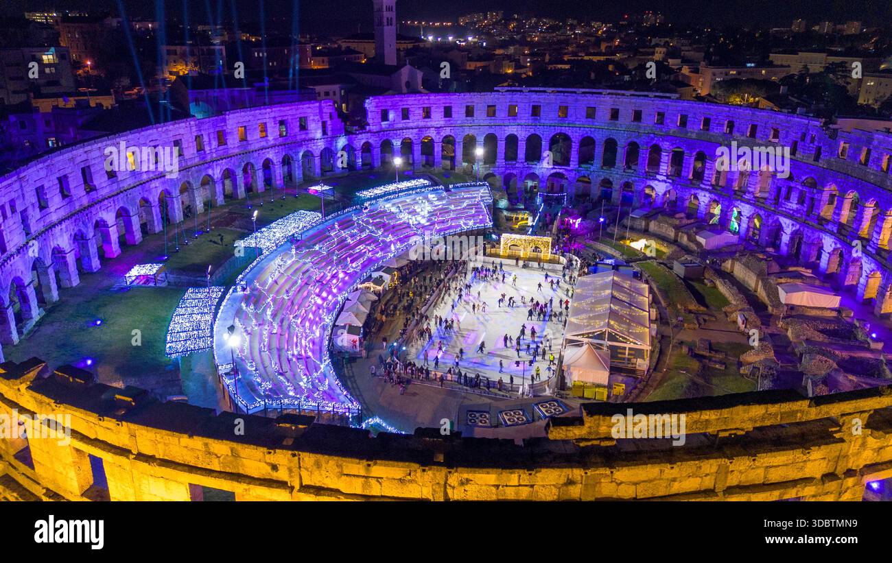 Aerial view of people ice skating during the opening ceremony of Advent ...