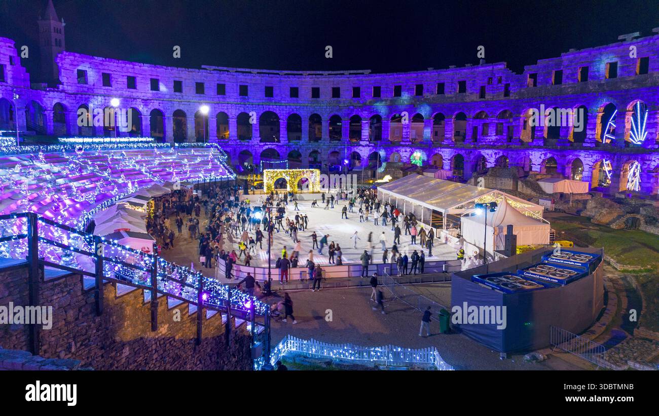 Aerial view of people ice skating during the opening ceremony of Advent ...