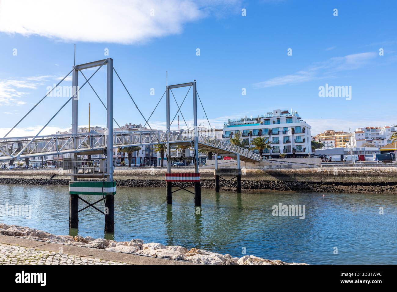Modern pedestrian bridge crossing the marina in Lagos, Algarve ...