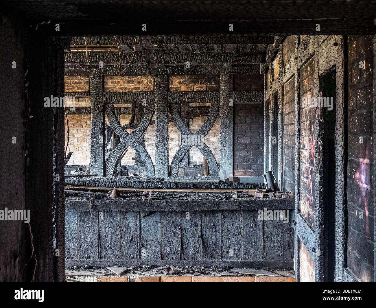 Charred Interior of Burned Bar with Soot-Covered Timbers, Exposed Brick ...