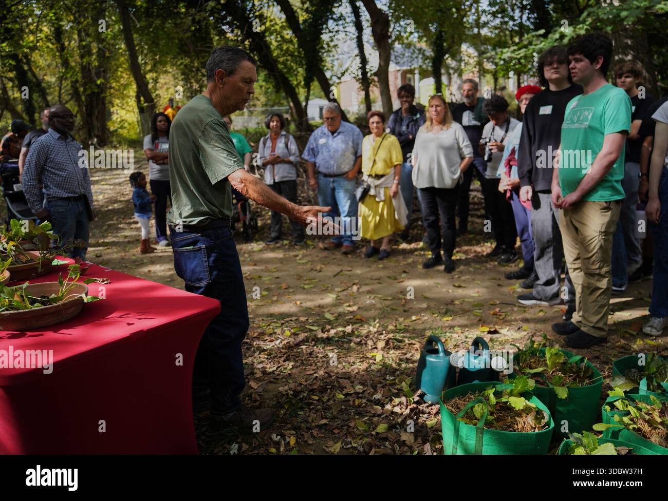 Visitors learn about fall crops like lettuce and kale while on a ...