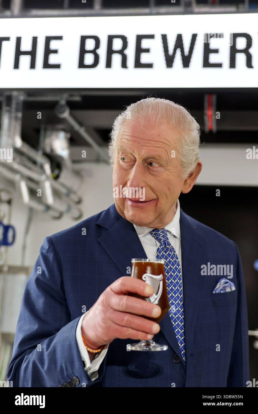 King Charles III tastes a Guinness during a visit to officially open ...