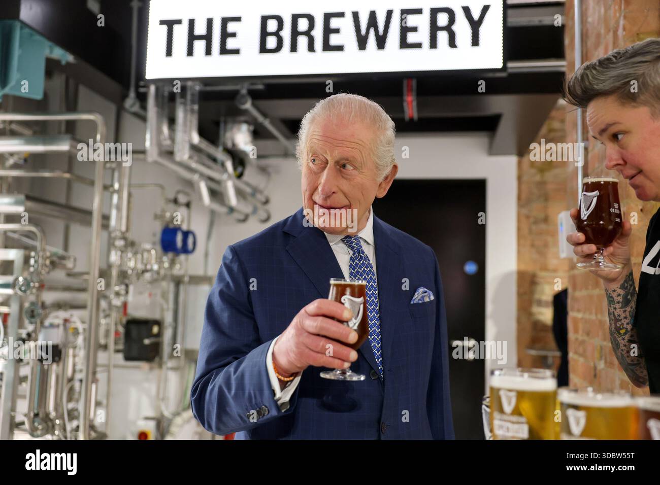 King Charles III tastes a Guinness during a visit to officially open ...