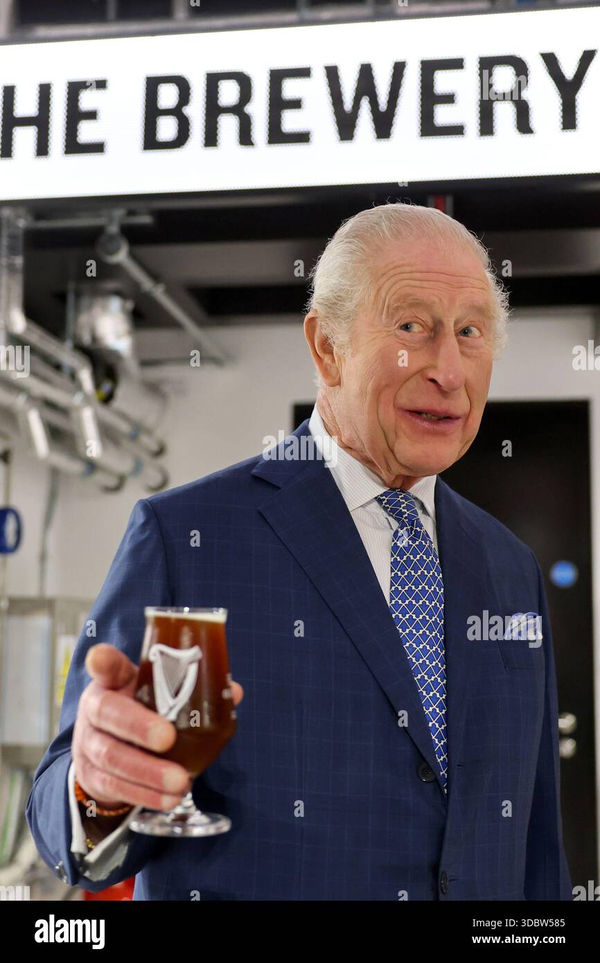 King Charles III tastes a Guinness during a visit to officially open ...