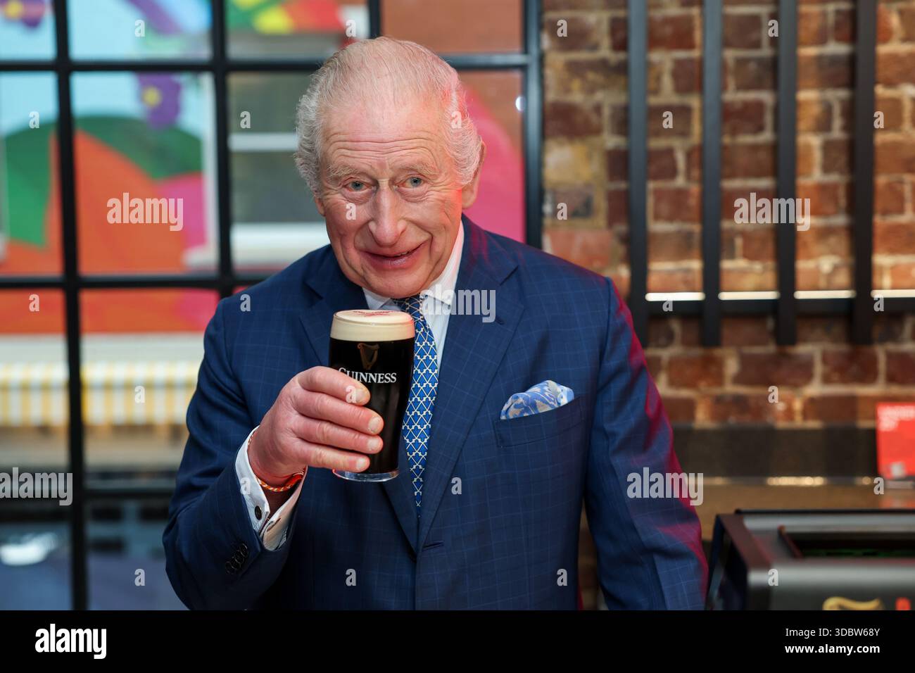 King Charles III tastes a pint of Guinness during his visit to the ...
