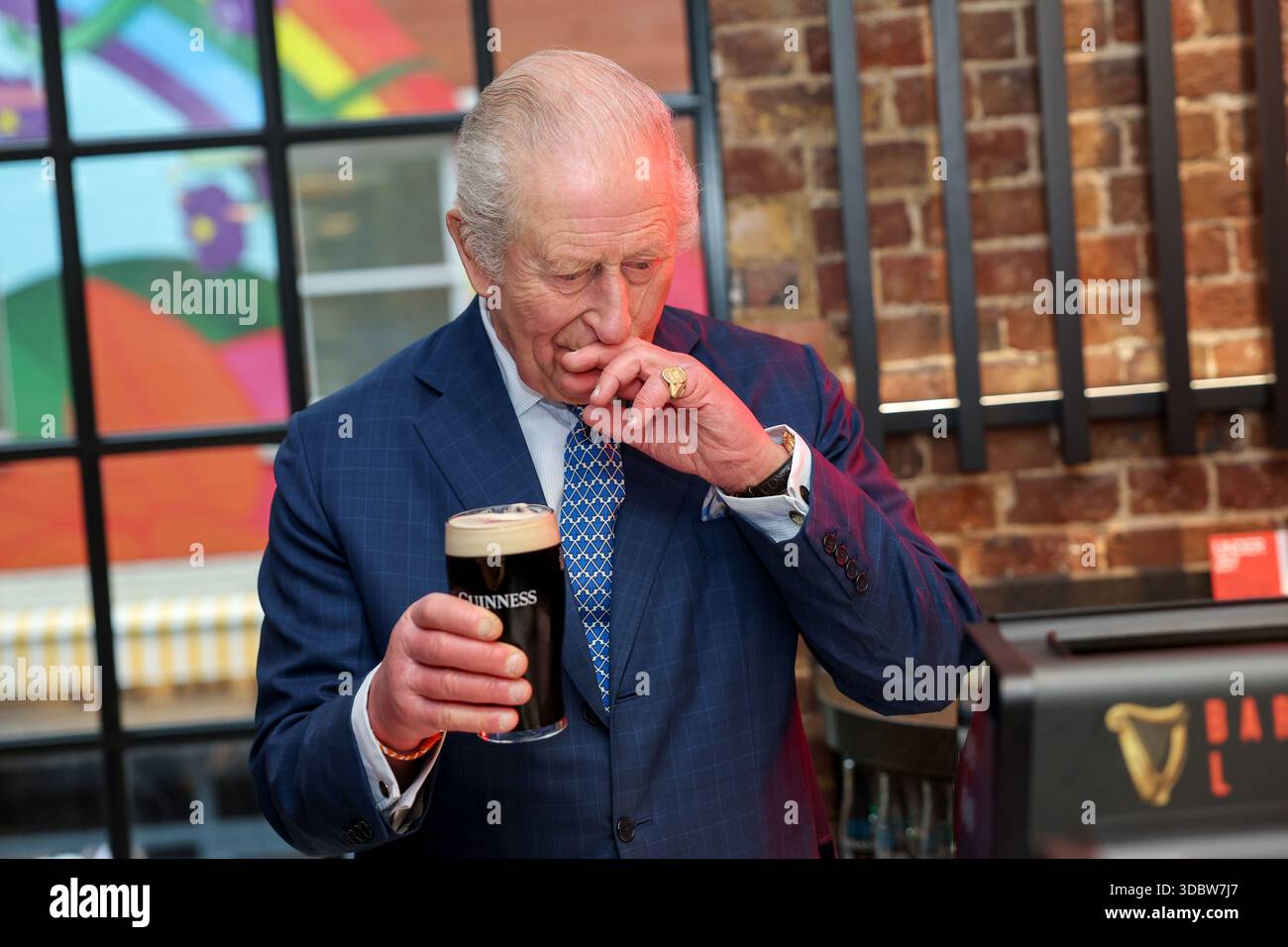 King Charles III tastes a pint of Guinness during his visit to the ...
