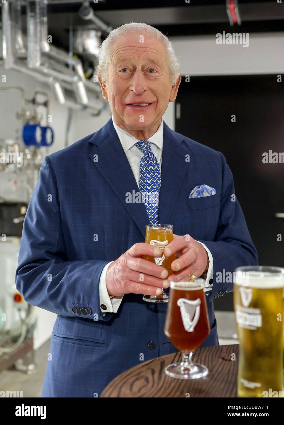 King Charles III tastes a pint of Guinness during his visit to the ...