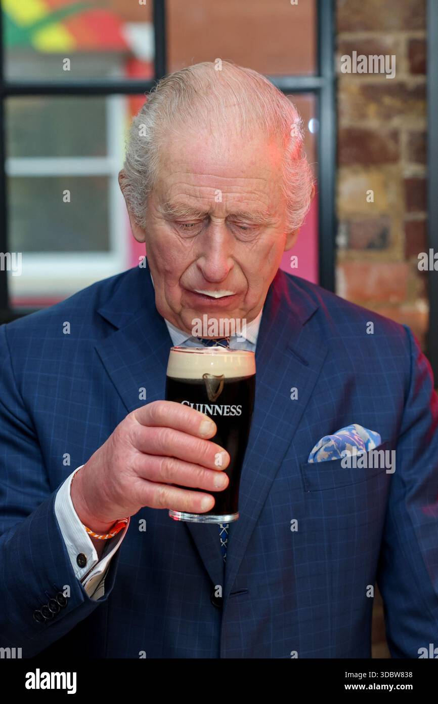 King Charles III tastes a pint of Guinness during his visit to the ...