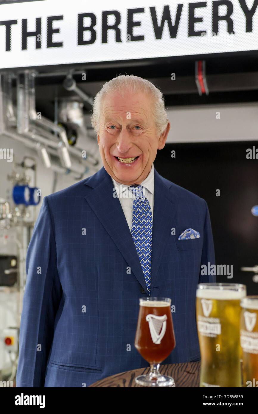 King Charles III tastes a pint of Guinness during his visit to the ...