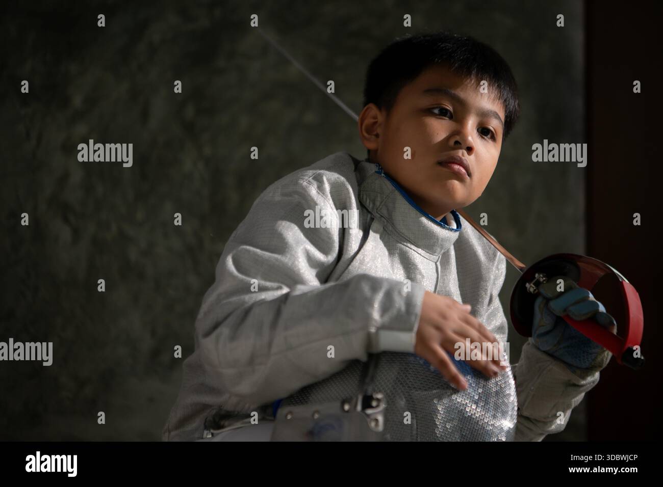 Boy in fencing gear hi-res stock photography and images - Alamy