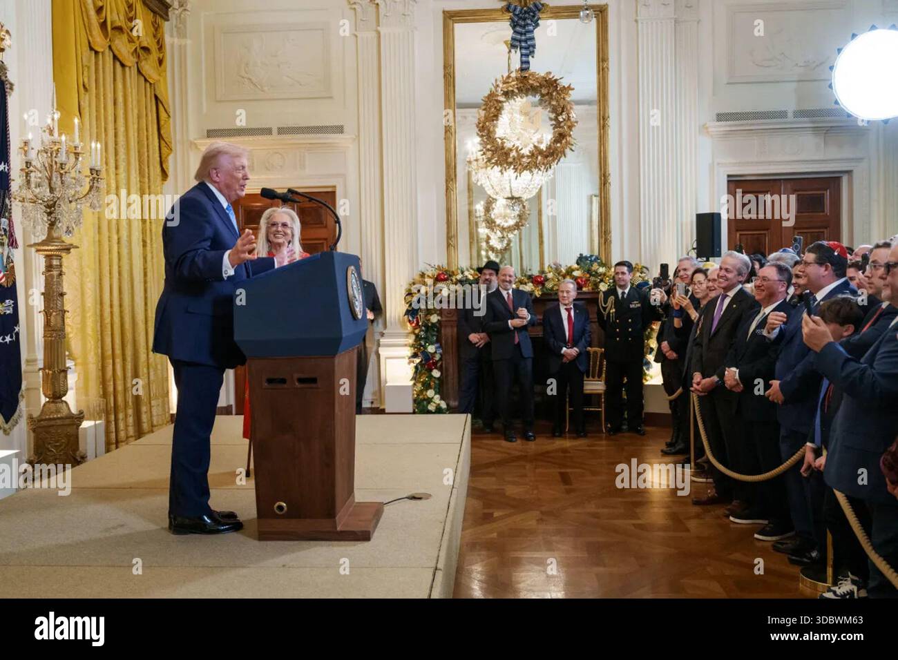 President Donald Trump attends a Hanukkah reception as guests gather ...