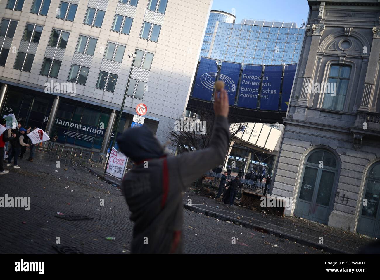 Clashes between protestors and riot police at the entrance to the ...