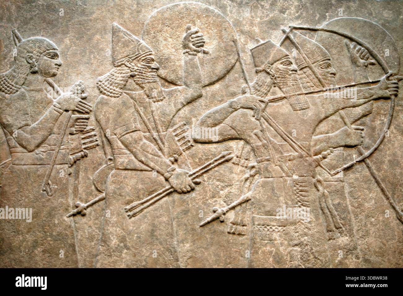 Assyrian eighth-century BC stone relief depicting soldiers in battle ...