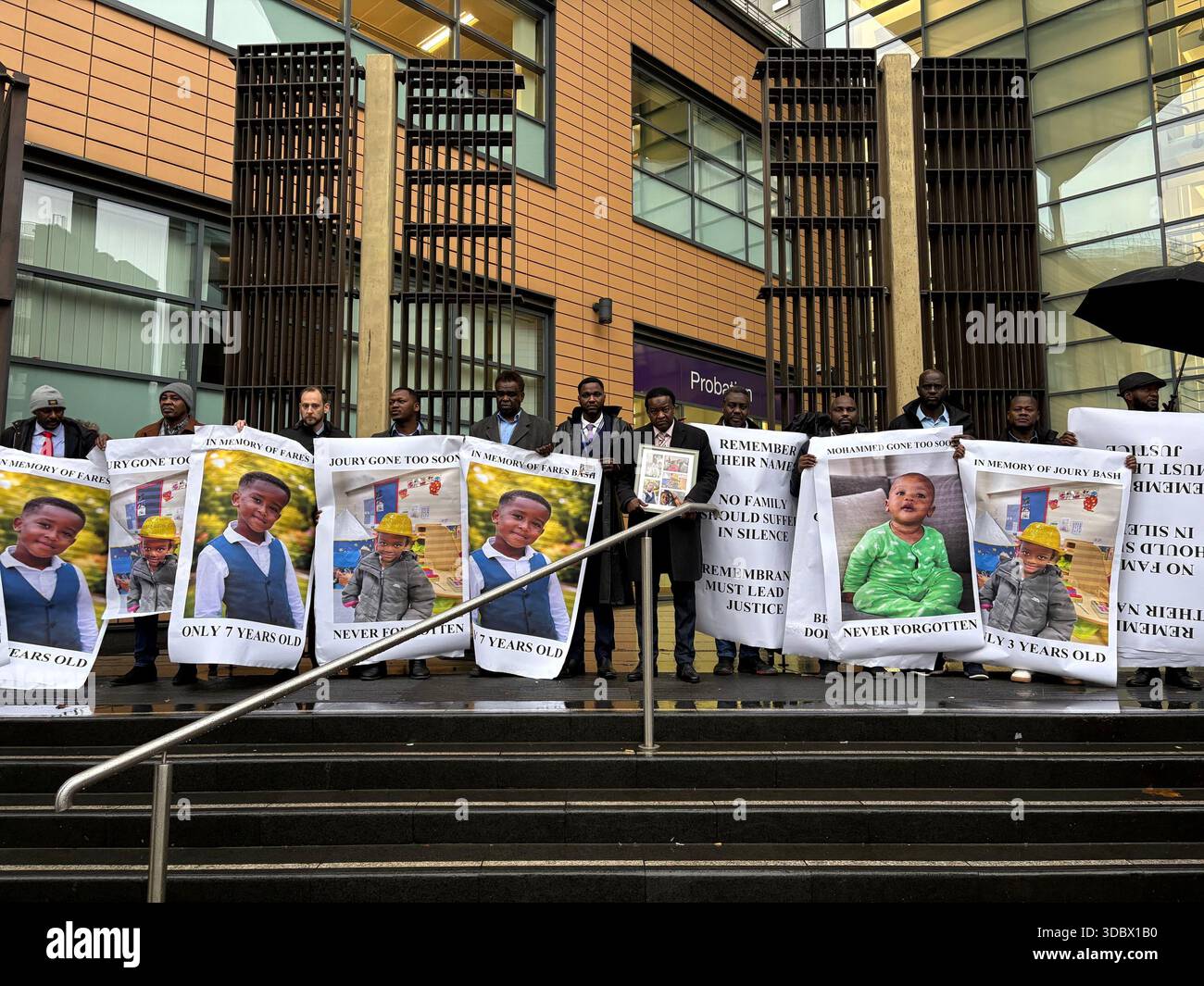 Alfil Bash, (holding photo frame), father of seven-year-old Fares Bash ...