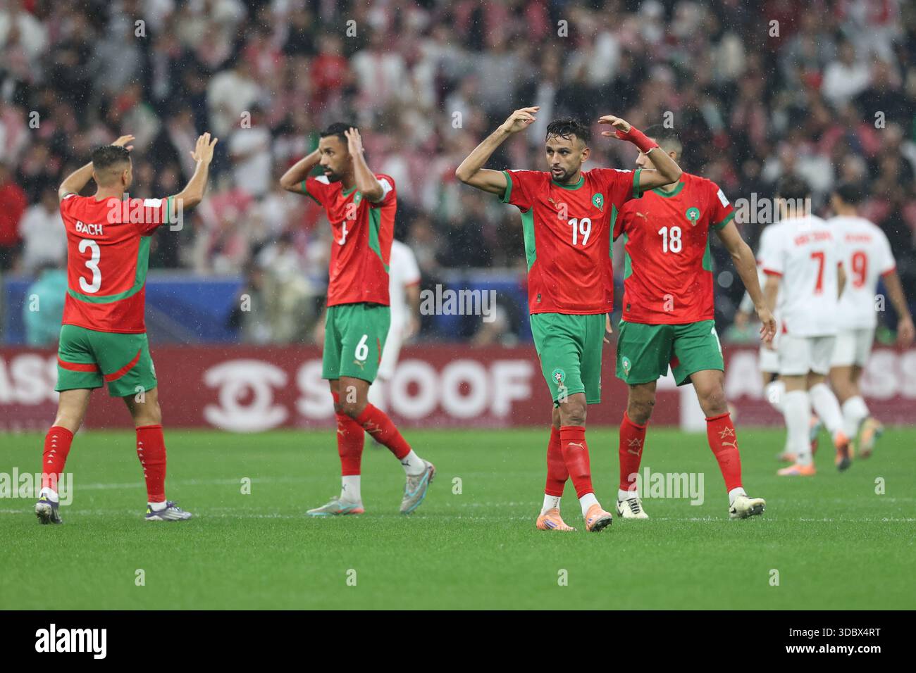 Moroccan players celebrate after teammate Oussama Tannane scored the ...