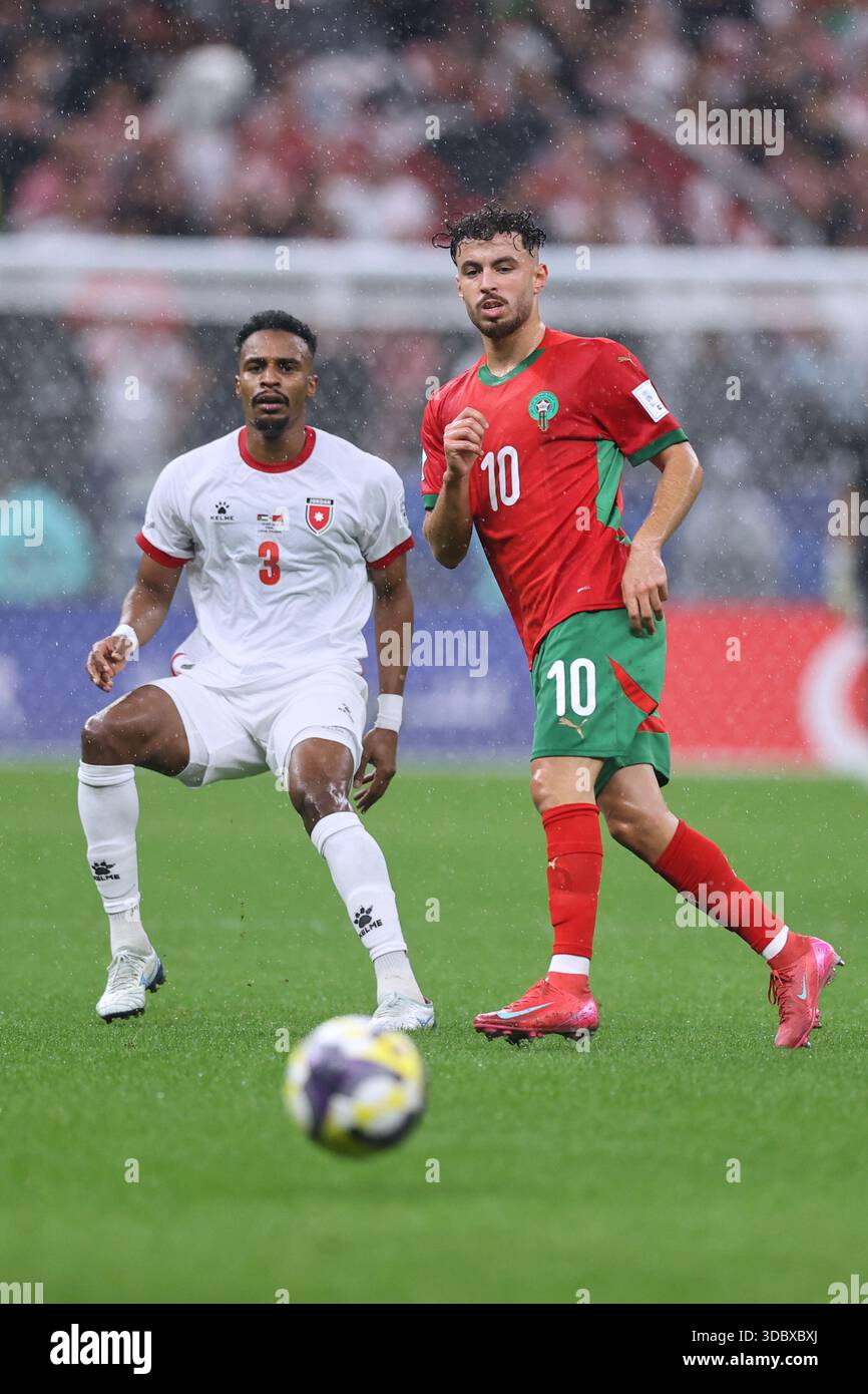 Morocco's Amin Zahzouh, right, and Jordan's Abdallah Nasib look at the ...