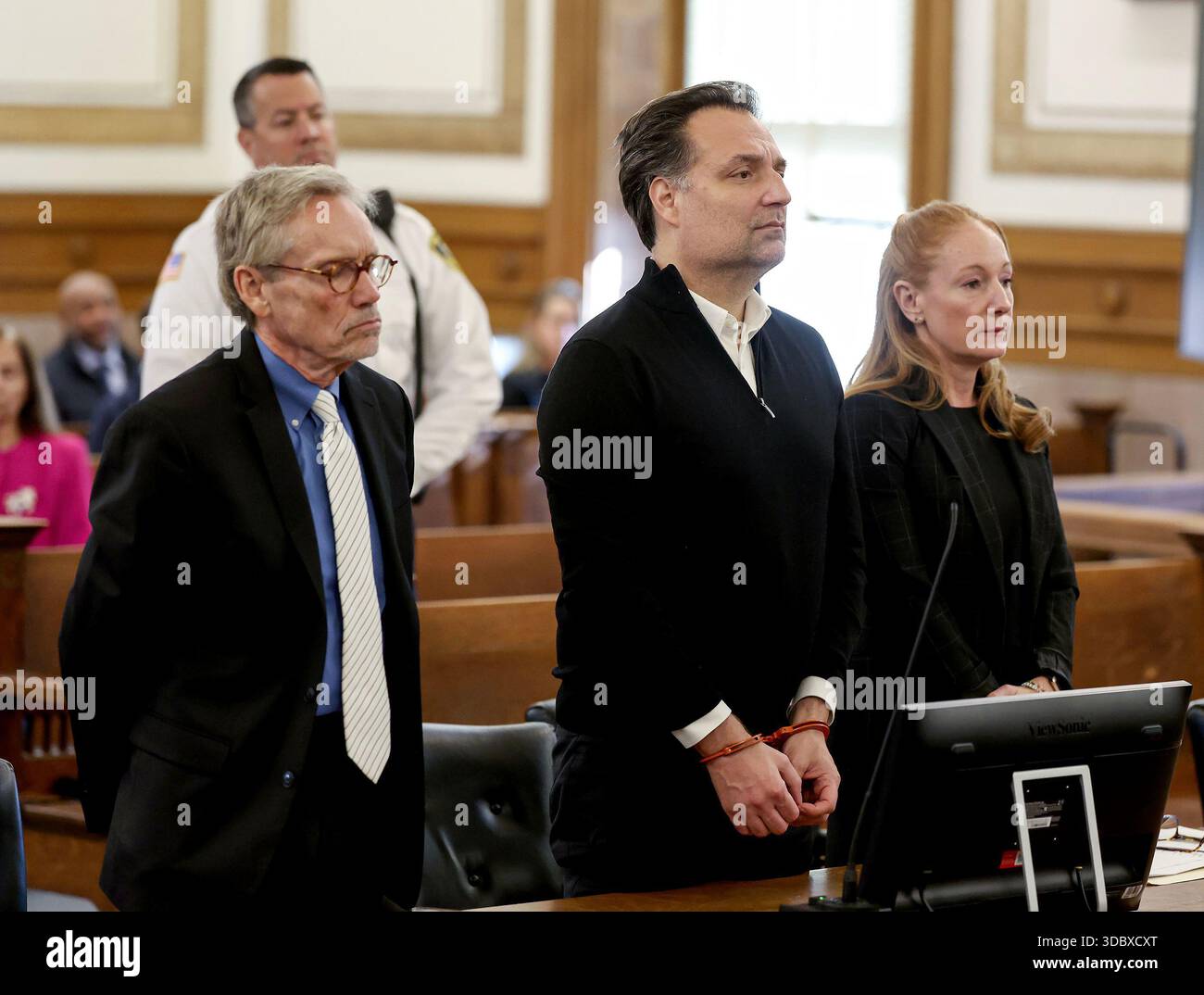 Brian Walshe, center, is sentenced in Norfolk Superior Court in Dedham ...