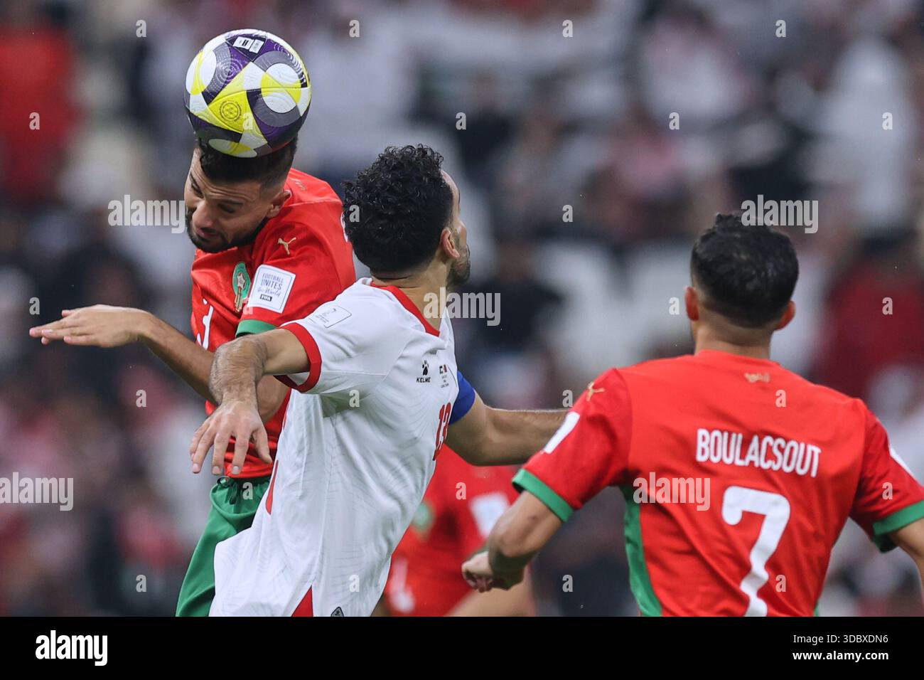 Morocco's Anas Bach, top left, goes for a header with Jordan's Abdallah ...
