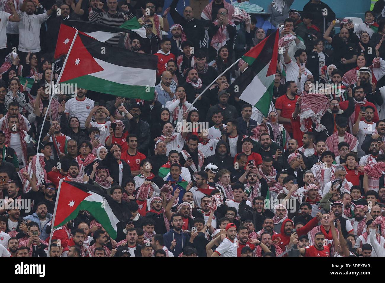 Jordan's supporters cheer at the stand during to the FIFA Arab Cup ...