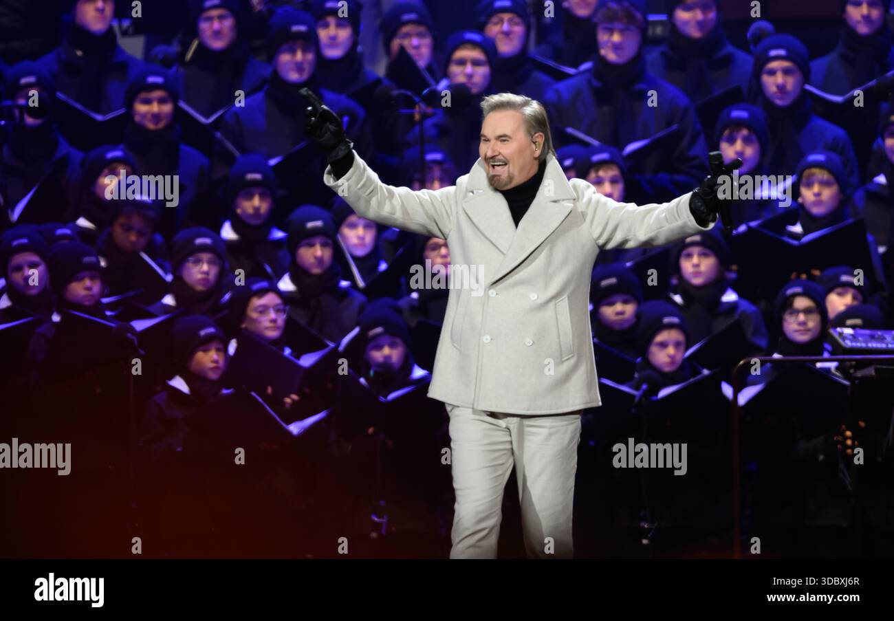 Dresden, Germany. 18th Dec, 2025. Singer Nik P. sings on stage at the ...