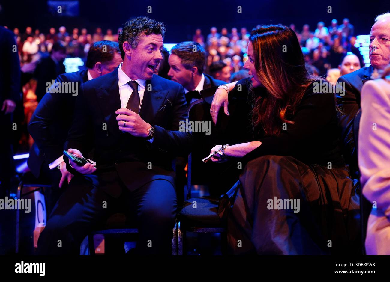 Rory McIlroy (left) speaks to Clare Fleetwood, wife of Tommy Fleetwood ...