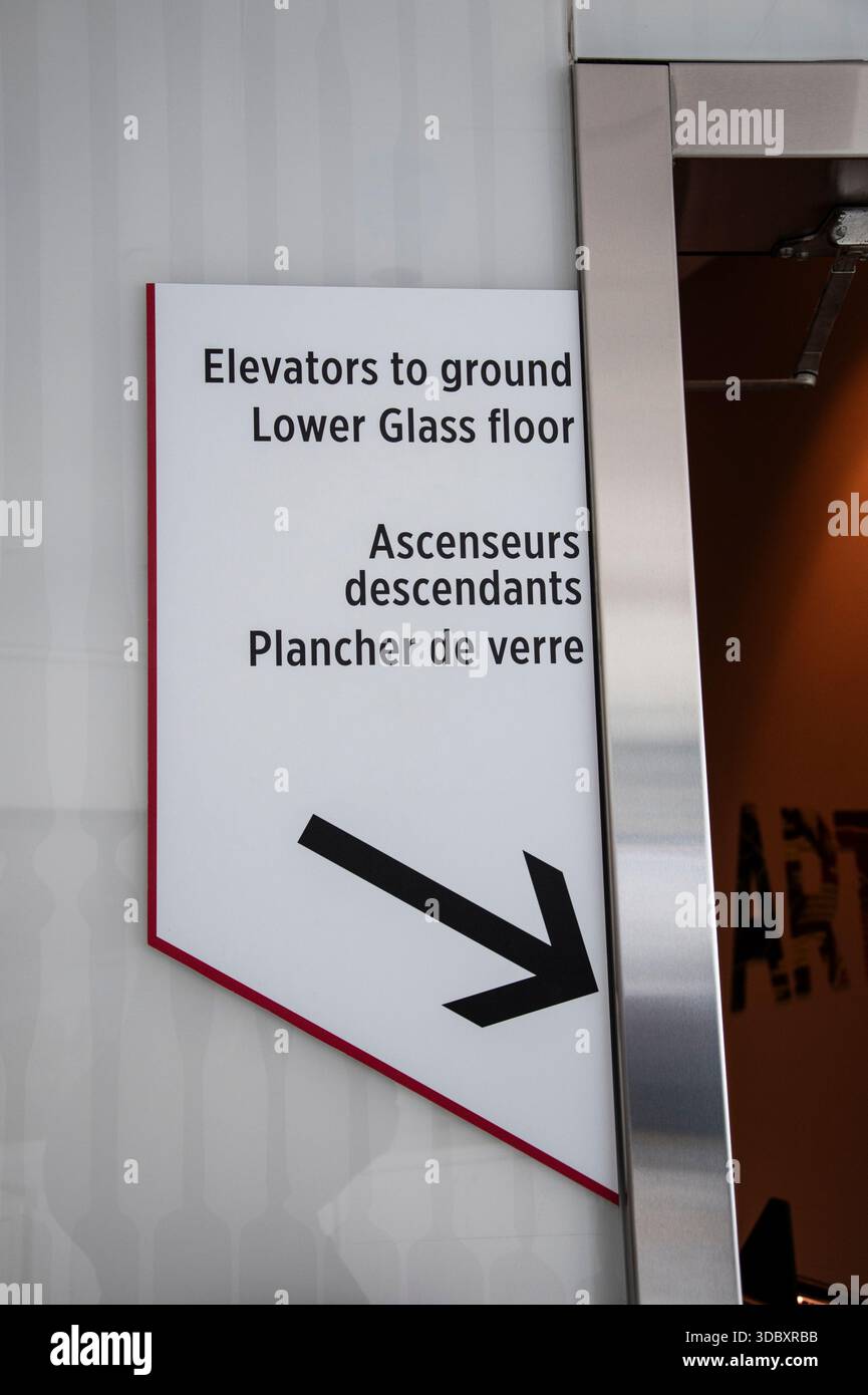Elevator sign directional arrow hi-res stock photography and images - Alamy