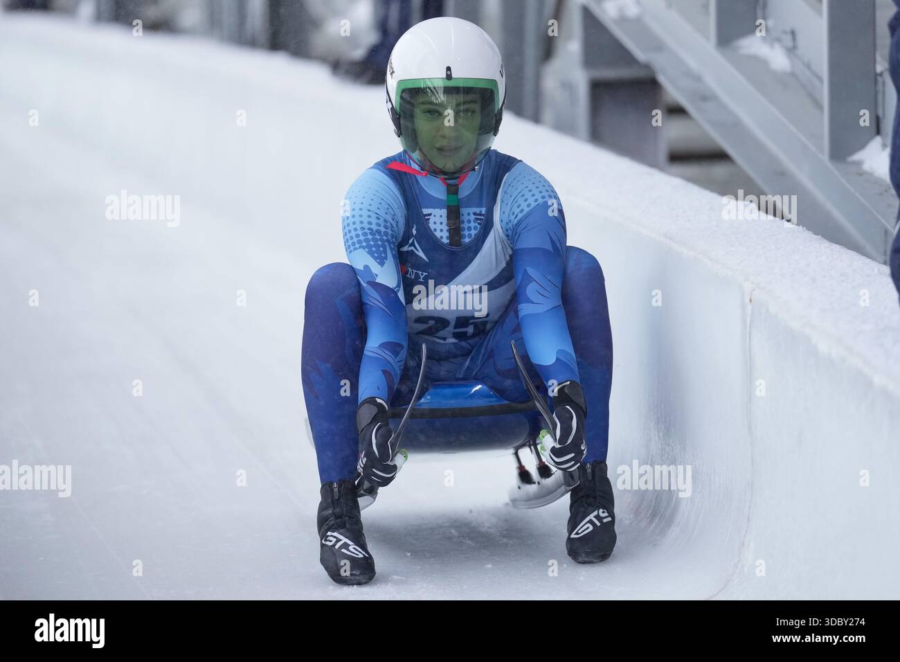 Russian luge athlete Daria Olesik finishes a qualifying race to compete ...