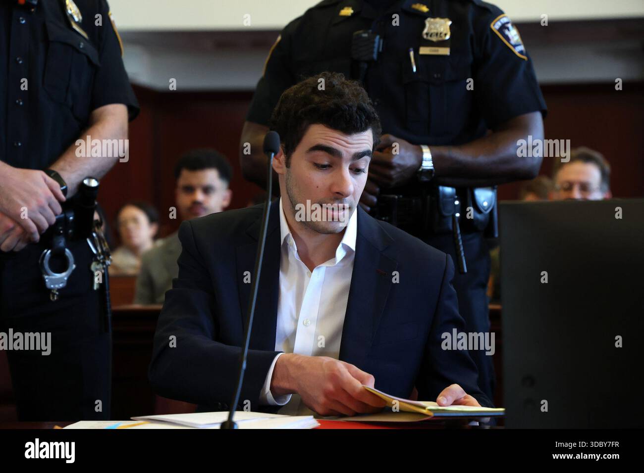 Alleged killer Luigi Mangione confers with his attorney, Jacob Kaplan ...