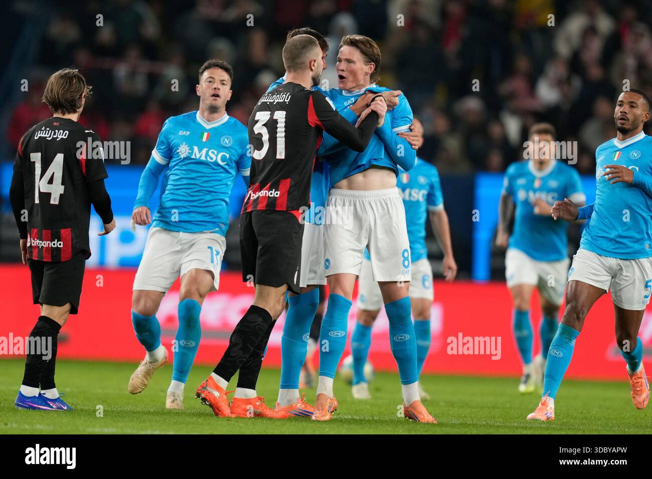 Napoli's Scott McTominay argues with AC AC Milan's Strahinja Pavlovic ...