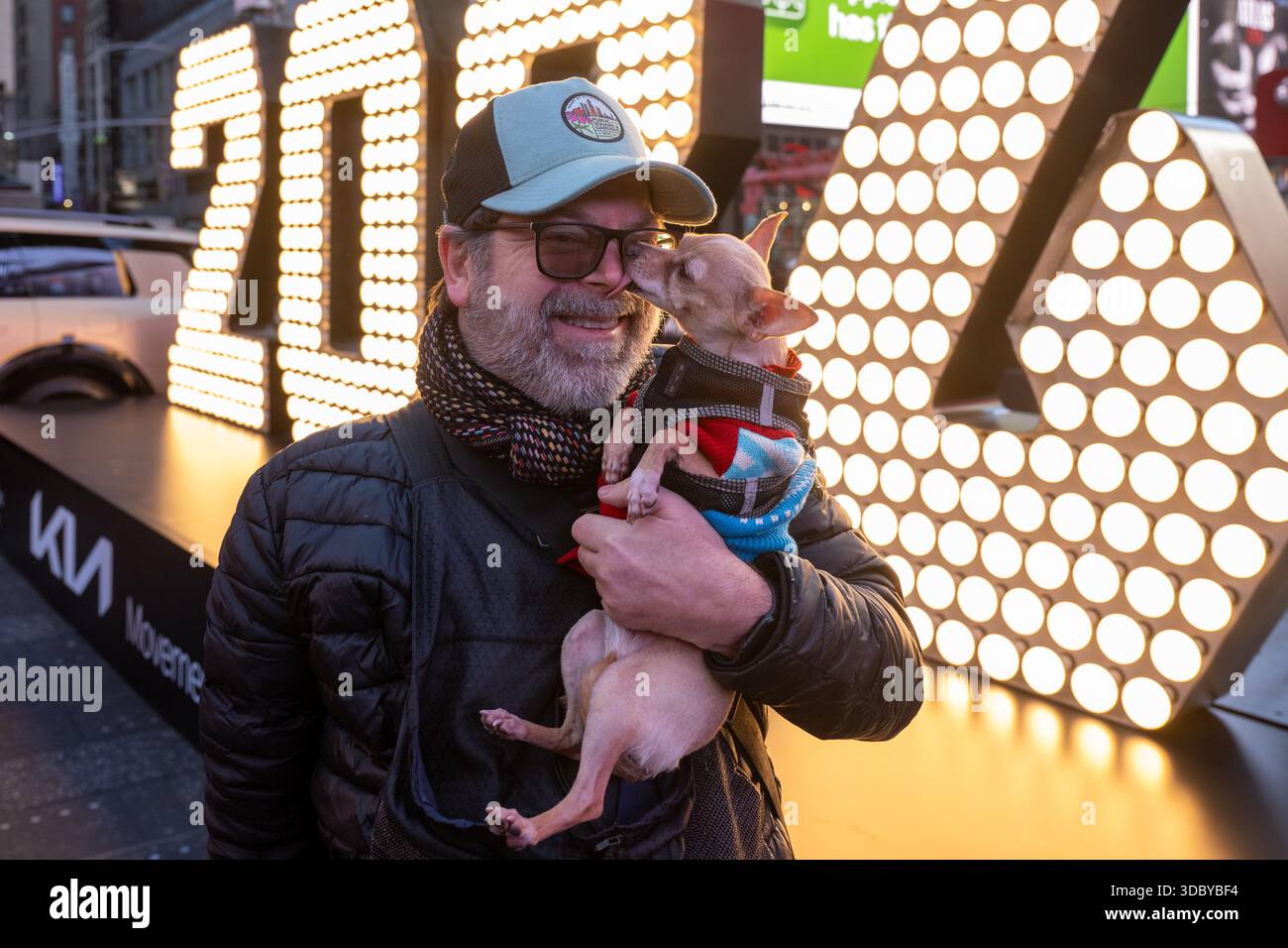 Joe Simon and his dog Gladys pose with he Times Square New Year's Eve ...