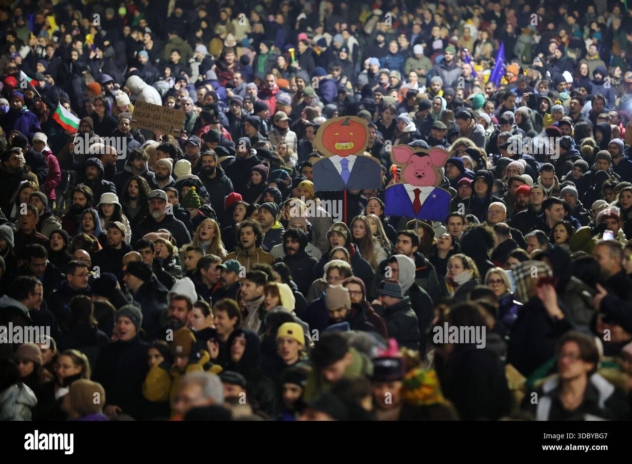 Caricatures of ruling leaders seen on posters as tens of thousands of ...