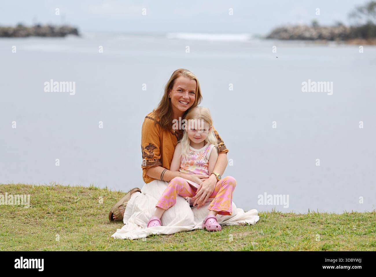 Jade King pictured with her daughter Juniper King-Willis in Evans Head ...