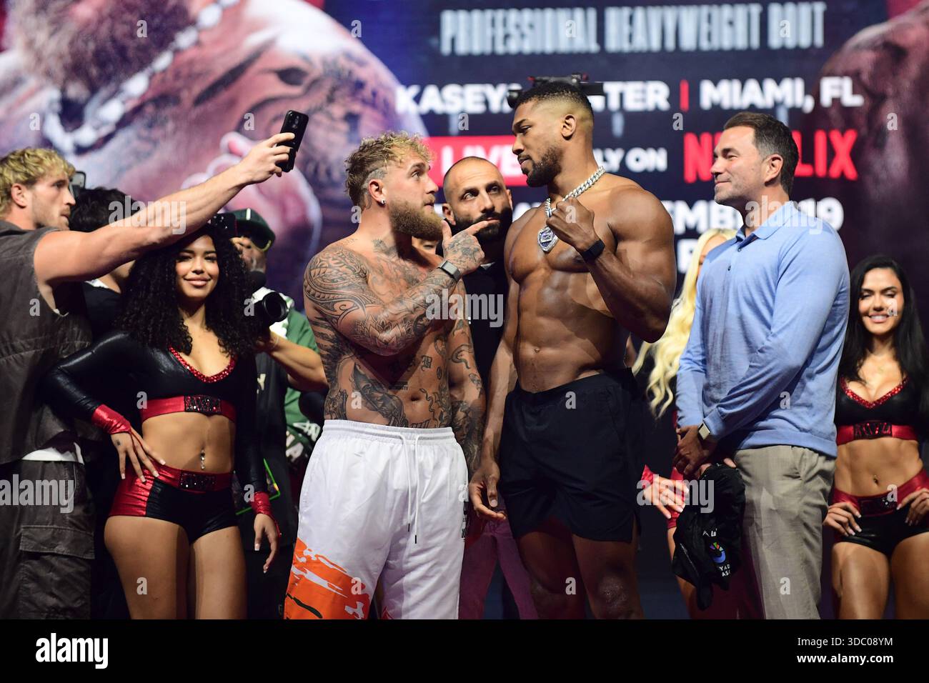 Jake Paul exchanges words with Anthony Joshua during the official weigh ...
