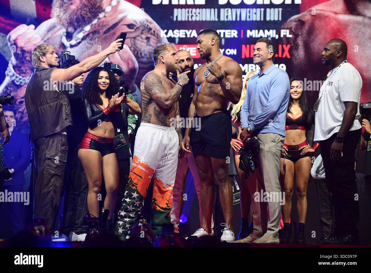 Jake Paul exchanges words with Anthony Joshua during the official weigh ...