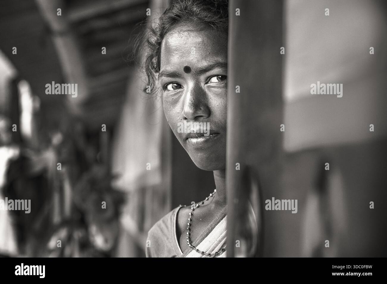 Candid B&W Portrait of a Tribal Woman in a Village Doorway, Purulia ...