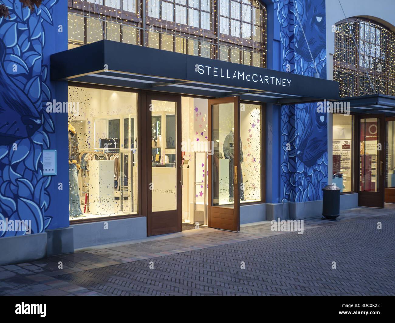 Stella McCartney store with beautifully lit storefront featuring ...