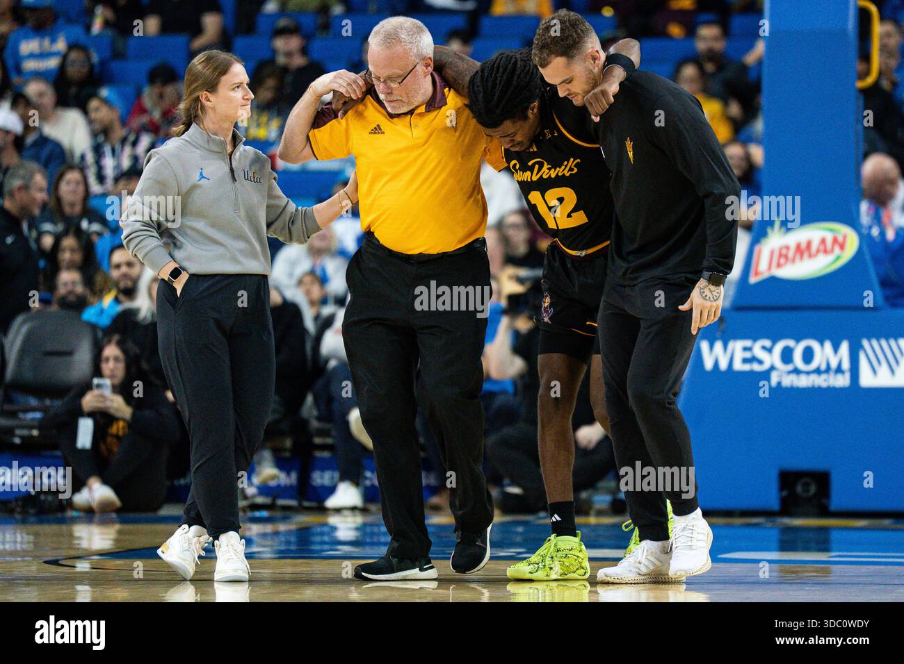 Arizona State Sun Devils guard Trevor Best (12) leaves the game after ...