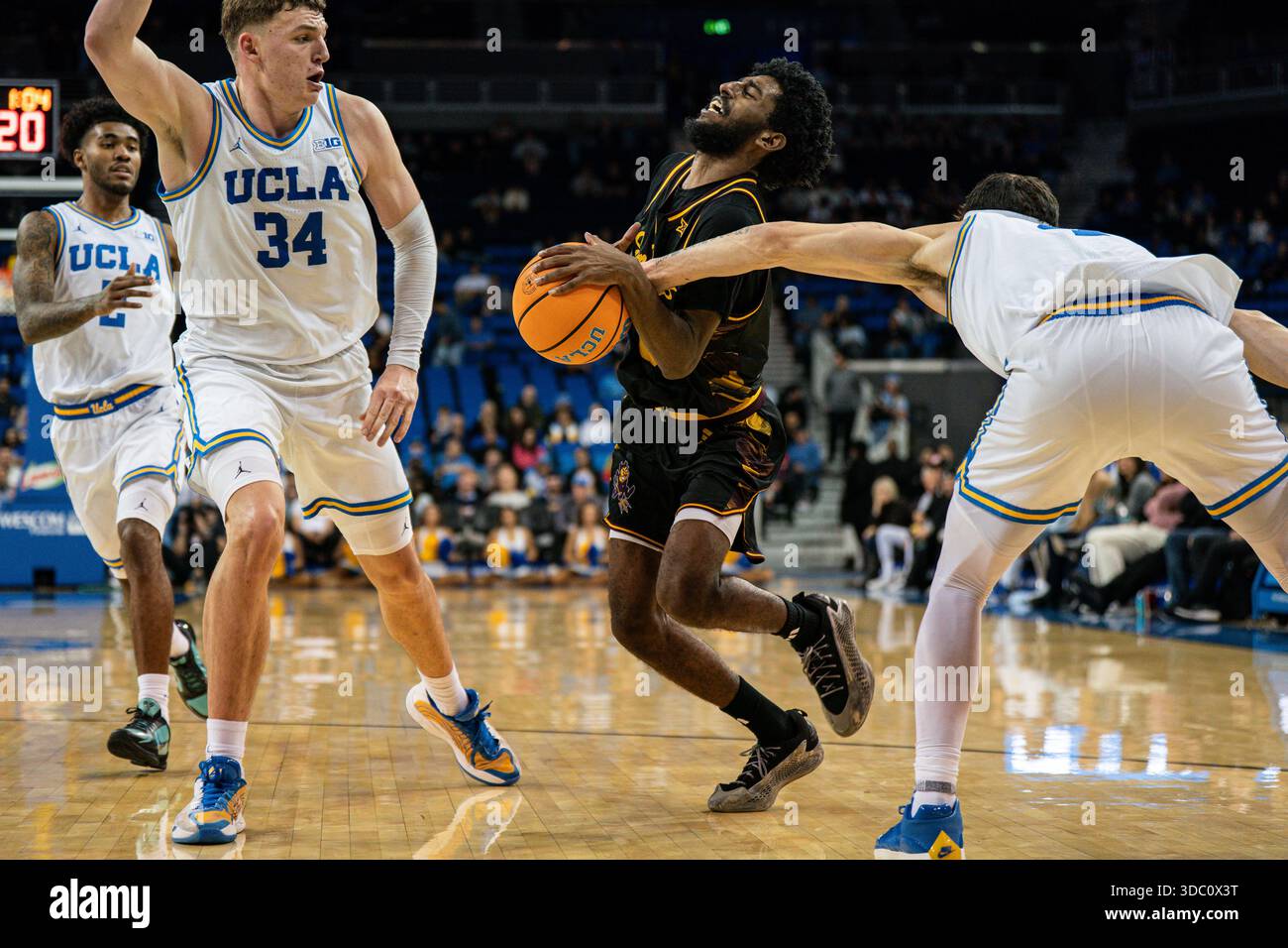 Arizona State Sun Devils guard Maurice Odum (5) is fouled by UCLA ...
